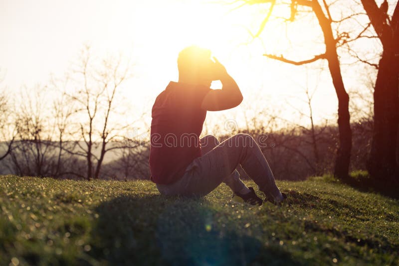 Exercise in sunset stock image. Image of lifestyles, beard - 89494651