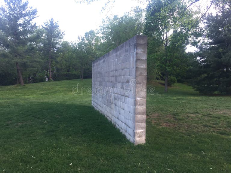 Exercise Wall Constructed of Cinder Blocks Surrounded by Grass in Park ...