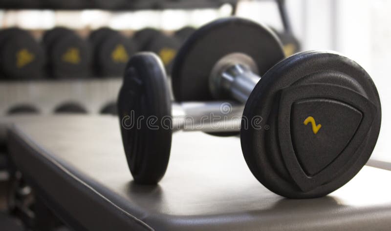 Exercise with weights stock photo. Image of muscular - 76627802