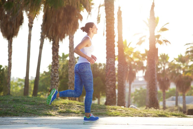 Exercise Woman Jogging Outside Stock Photo - Image of leisure, fitness ...
