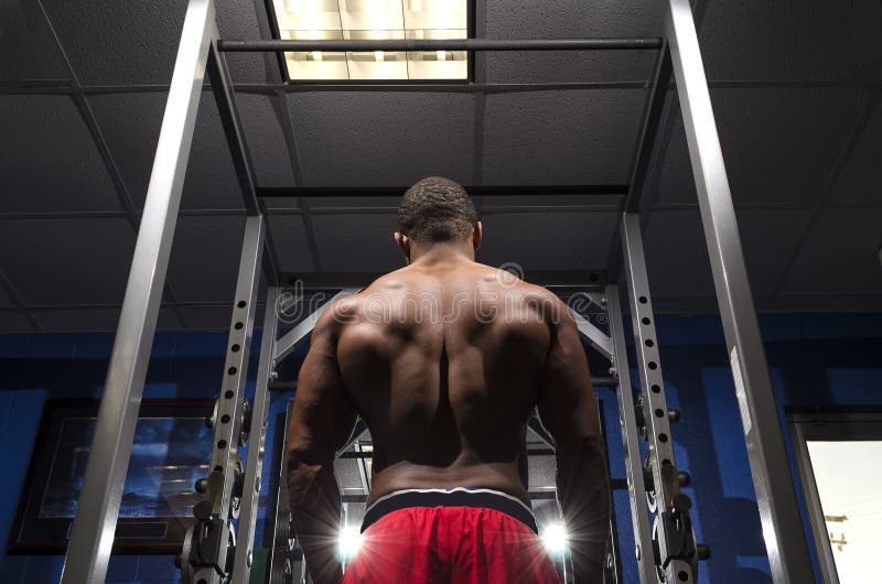 Working Out Hard in Dramatic Light Stock Image - Image of muscular ...