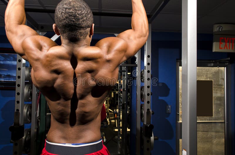 Exercising in Dramatic Light Stock Photo - Image of fitness, defined ...