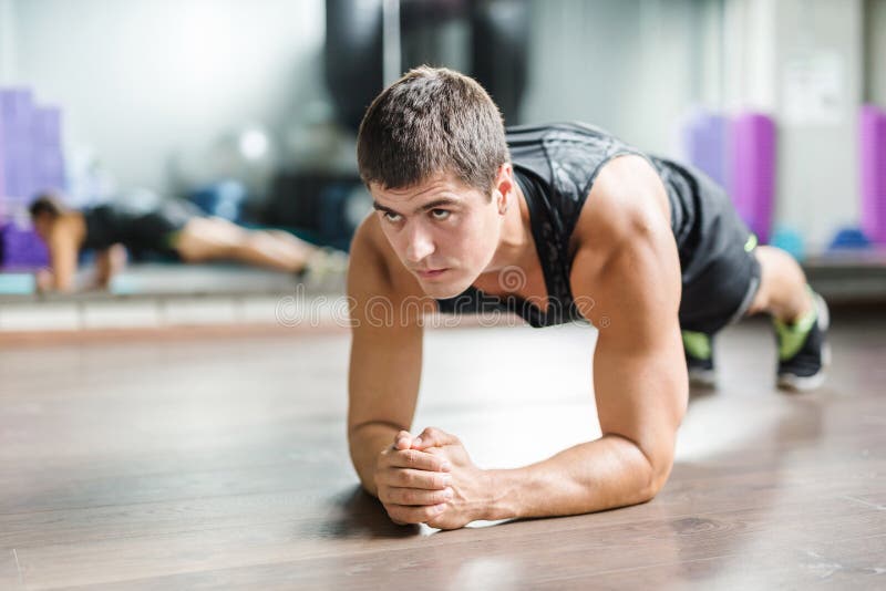Exercising in gym stock image. Image of floor, sport - 79434829