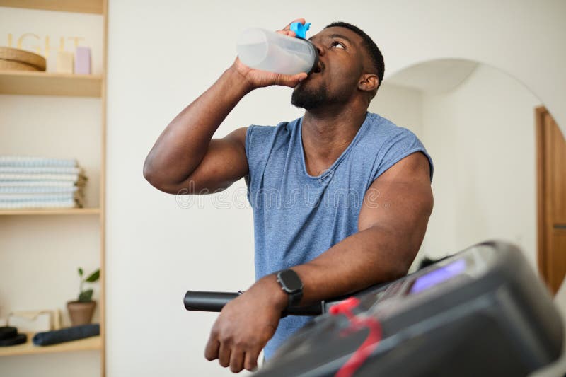 Exercising Man Drinking Water during Workout Stock Photo - Image of ...