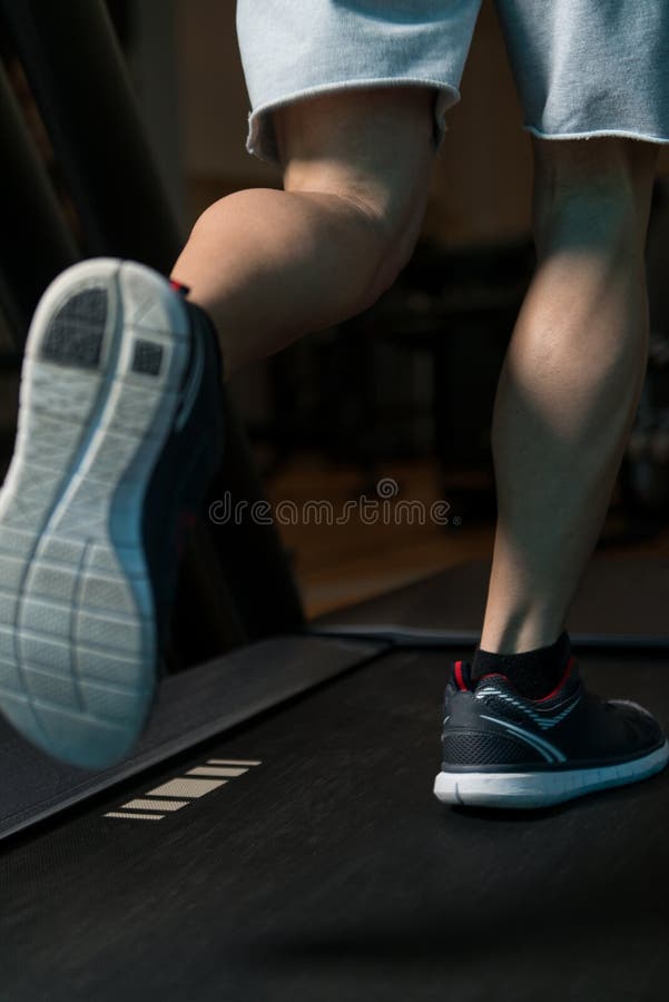 Exercising on a Treadmill Close-Up Stock Photo - Image of machine ...