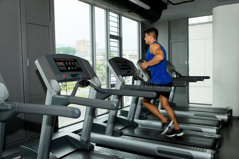 Exercising on a treadmill stock image. Image of care - 32781285
