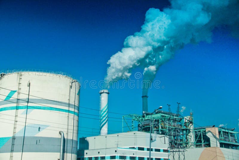 Factory And Exhaust Fumes Blown Into A Sky. Stock Image - Image of ...