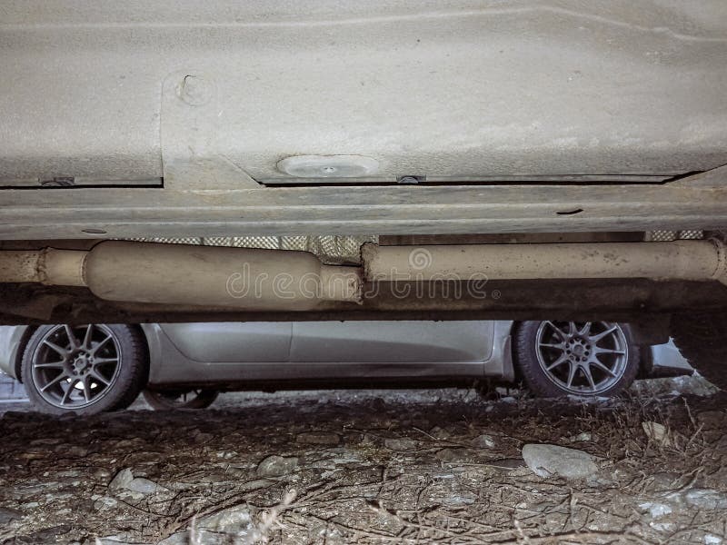 Exhaust Pipe Broken in Half Under the Car Stock Photo - Image of fault ...