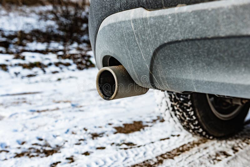 Exhaust Pipe with with Pure Smoke of Modern Black Car in Winter. Stock ...