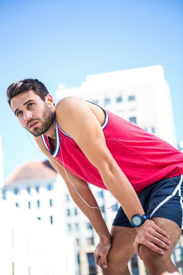 Exhausted Athlete Leaning Forward after an Effort Stock Photo - Image ...
