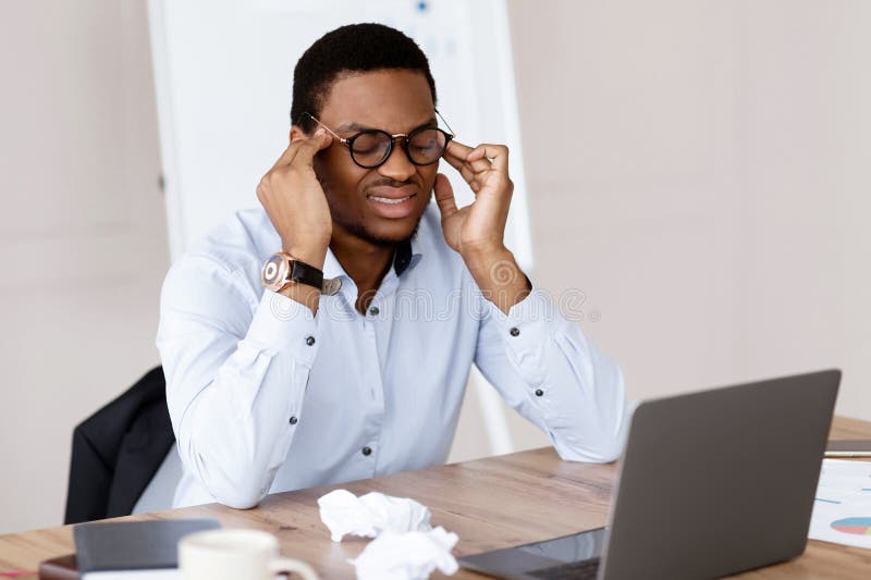 Exhausted Black Manager Having Headache while Working in Office Stock ...
