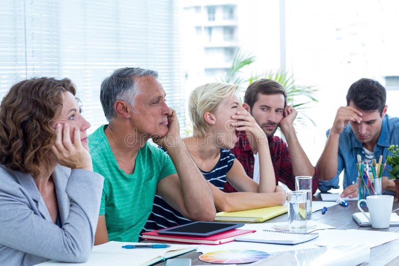 Exhausted Business Team in Office Stock Photo - Image of brainstorming ...