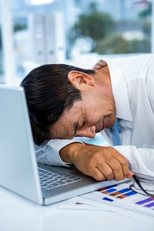 Exhausted Businessman Sleeping on His Laptop Stock Photo - Image of ...