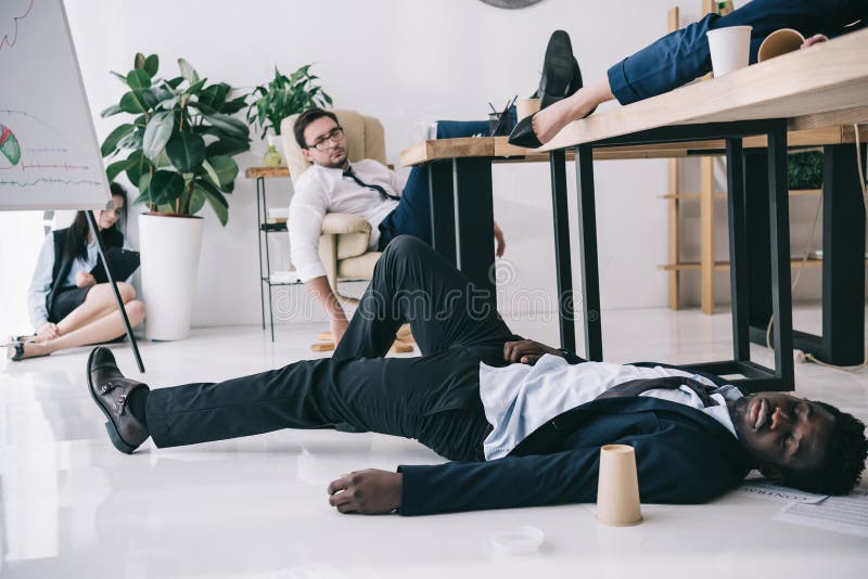 Exhausted Businesspeople Sleeping in Conference Hall Stock Photo ... Exhausted Businesspeople Sleeping in Conference Hall Stock Photo ...