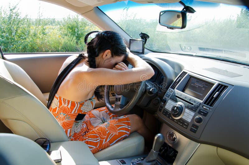 Exhausted Driver Resting on Steering Wheel Stock Photo - Image of ...