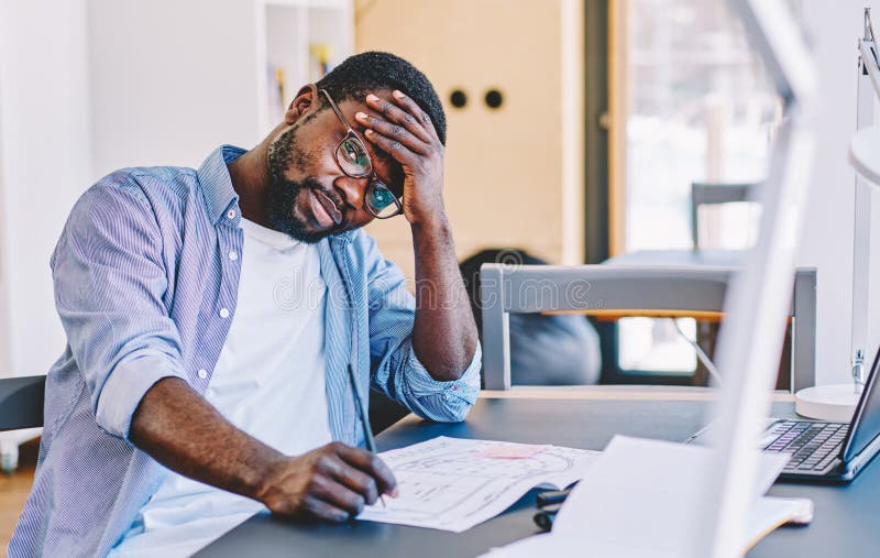 Exhausted Ethnic Architect Working in Office Stock Image - Image of ...