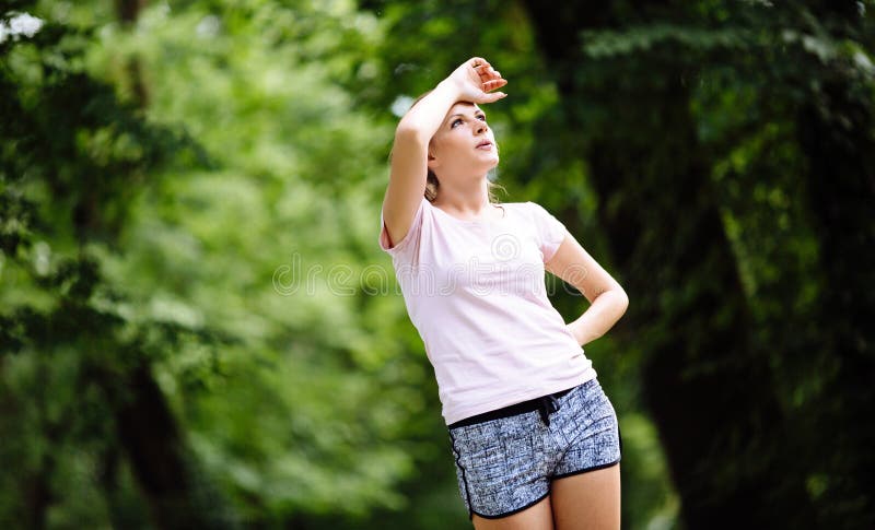 Exhausted Female Jogger Grasping for Air Stock Photo - Image of runner ...