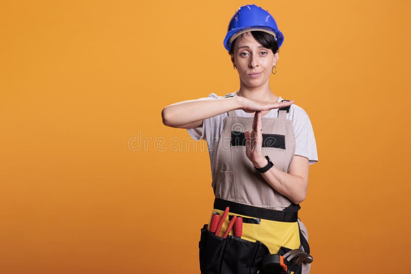 Exhausted Industrial Engineer Doing Timeout Sign Stock Photo - Image of ...