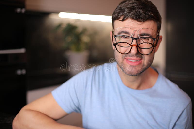 Exhausted Looking Man with Severe Vision Problems Stock Image - Image ...