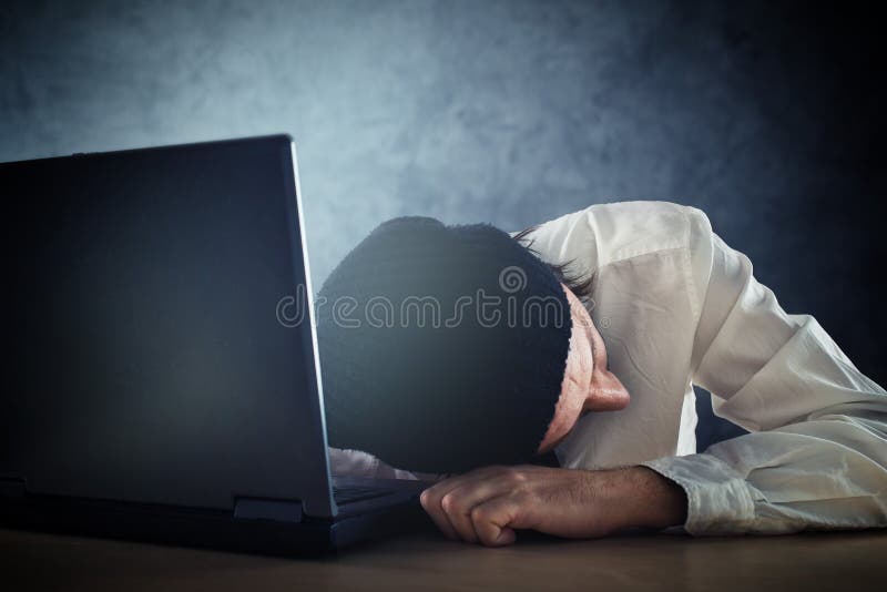 Exhausted Man Sleeps on Laptop at Office Desk Stock Photo - Image of ...