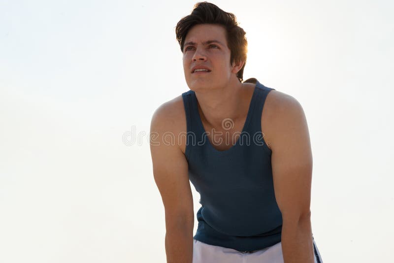 Exhausted Man Taking a Break after Jogging on Beach Stock Image - Image ... Exhausted Man Taking a Break after Jogging on Beach Stock Image - Image ...