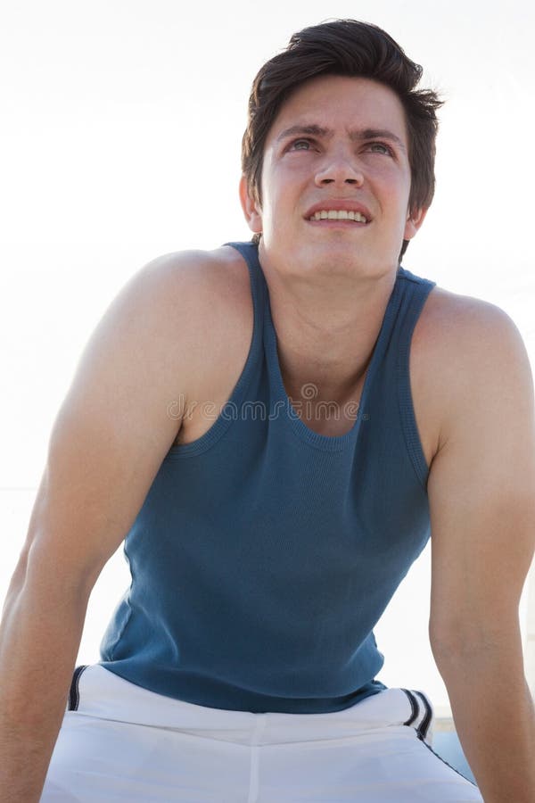 Exhausted Man Taking a Break after Jogging on Beach Stock Image - Image ... Exhausted Man Taking a Break after Jogging on Beach Stock Image - Image ...