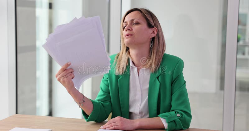 Exhausted Office Worker Manager Sitting at Desk Waving Documents Stock ...