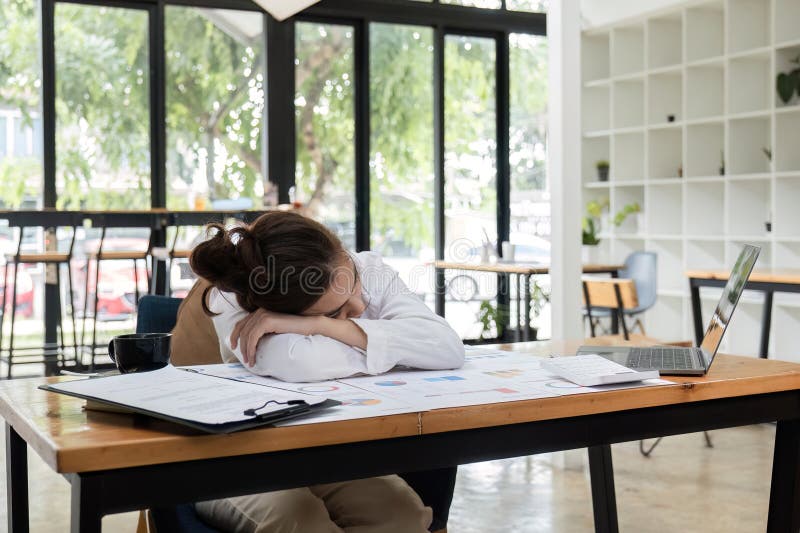 Exhausted Office Worker Sleeping at Desk with Laptop and Documents in ...
