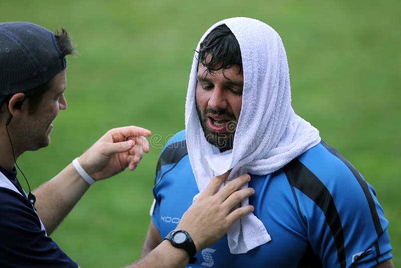 Exhausted rugby player editorial stock photo. Image of bandages - 73950413