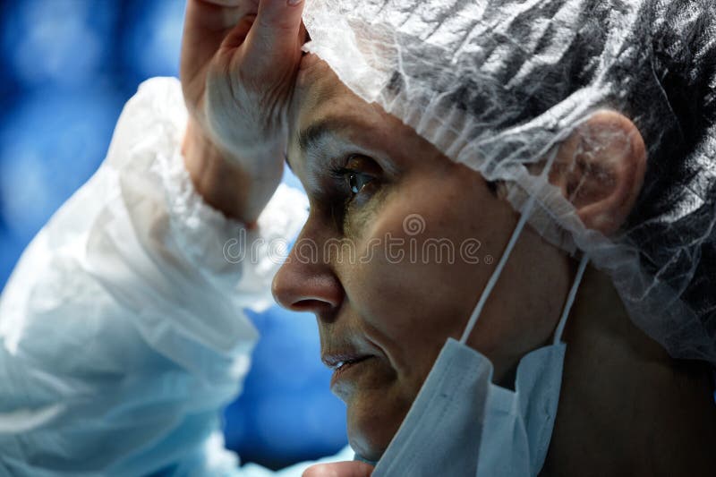 Exhausted Surgeon Rubbing Sweat of Forehead Stock Image - Image of ...