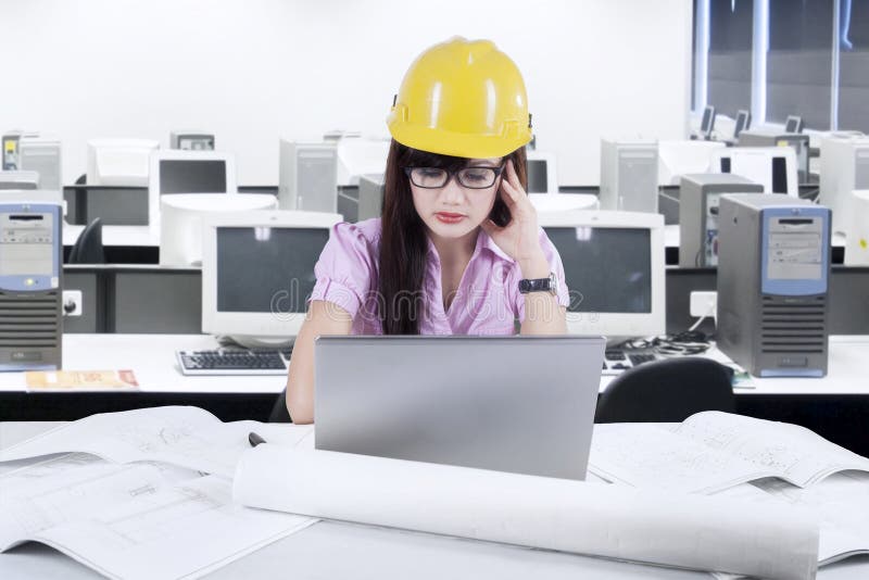 Exhausted young architect stock image. Image of notebook - 42228223
