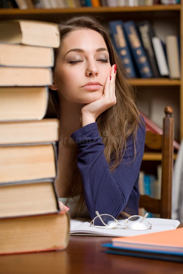 Exhausted young student. stock image. Image of brunette - 32751777