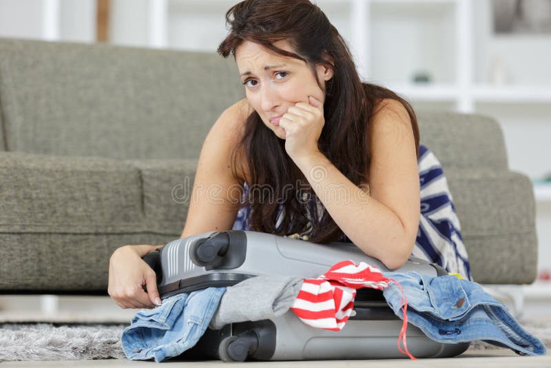 Exhausted Young Woman Packing Luggage Stock Image - Image of pressure ...
