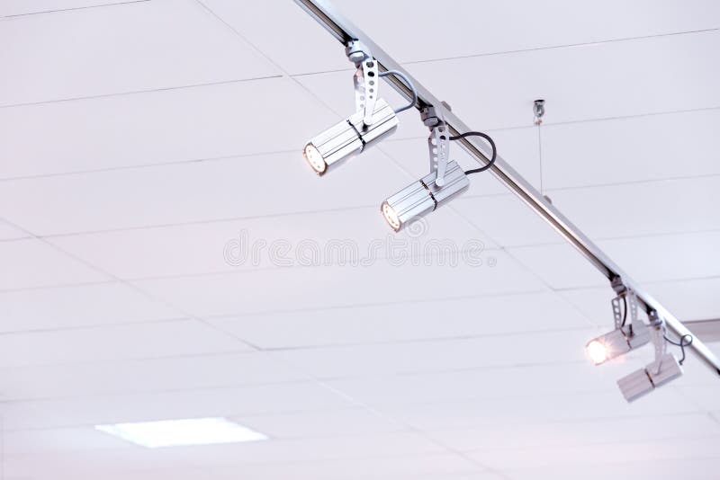 Row of Bright Halogen Spotlights on Exhibition Ceiling Stock Image ...