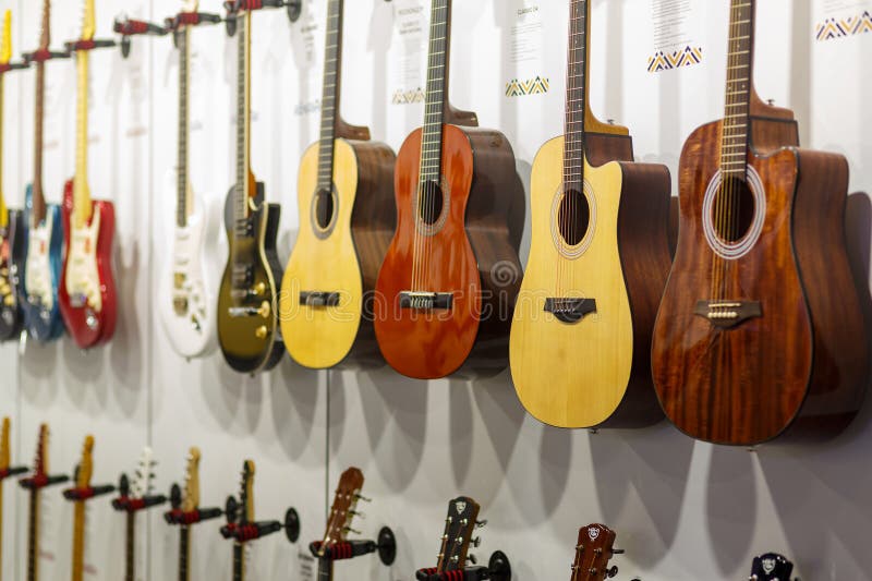 Exhibition Samples of Electric Instruments and Guitars on the Stand ...