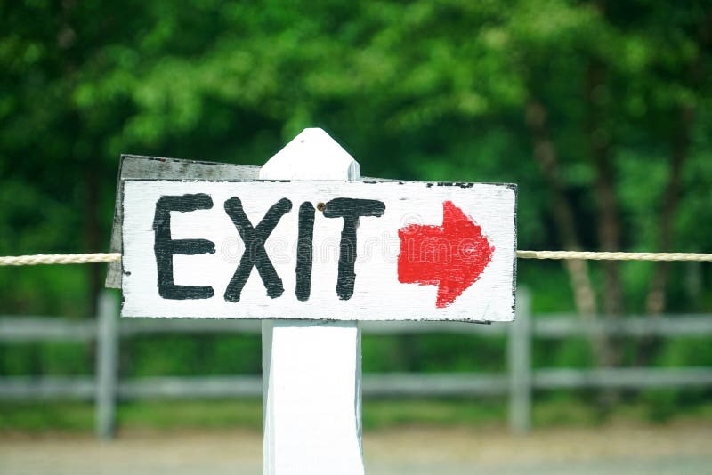 Exit and Arrow Sign Outdoor in Front of Trees Stock Image - Image of ...