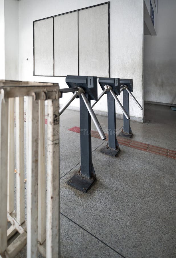 Three Turnstiles for People To Access the Bus Station Stock Image ...
