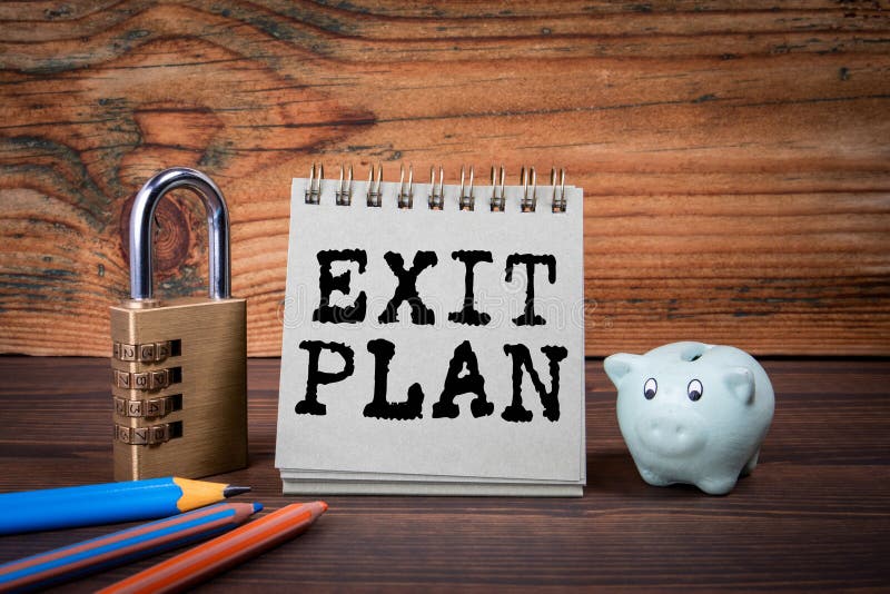 Exit Plan. Cardboard Notepad on Wooden Texture Table Stock Image ...