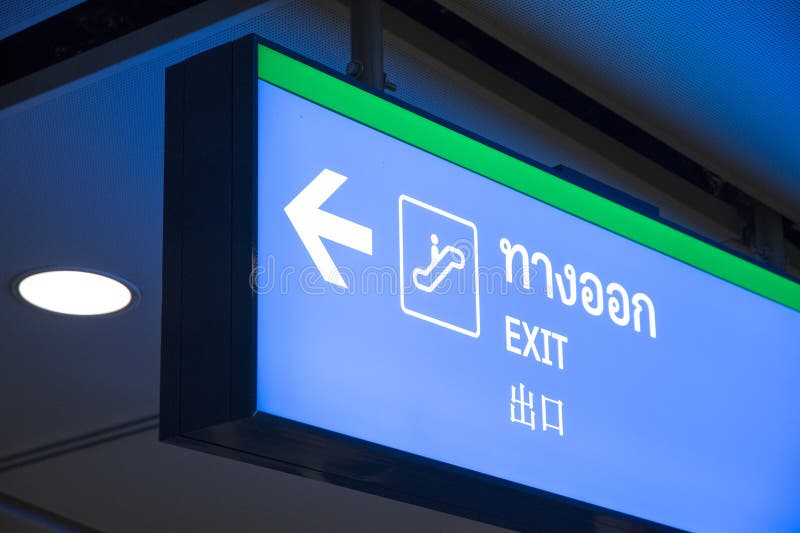 Exit Sign with Chinese, Thai and English Languages Stock Image - Image ...