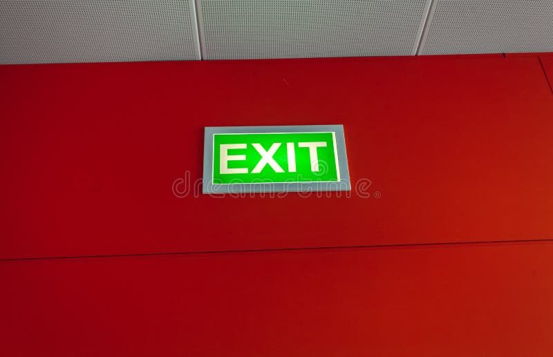 Glowing Red Exit Sign stock photo. Image of exit, dangerous - 129784964