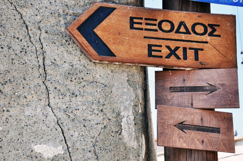 Exit Sign in Greek and English Stock Image - Image of signage, wooden ...