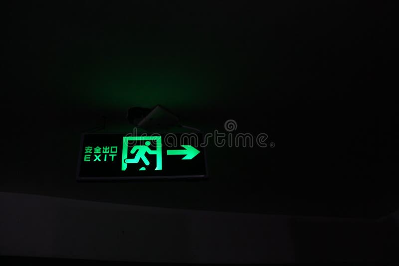 Exit Sign Hanging from the Ceiling Stock Image - Image of building ...