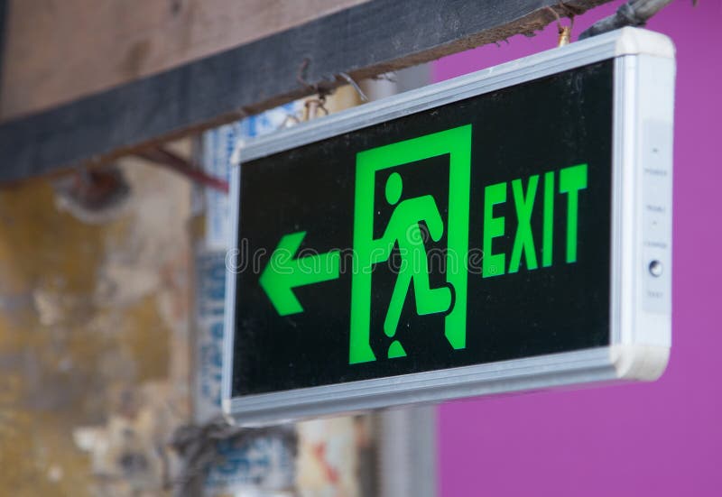 Exit Sign Points the Way Out Stock Image - Image of close, flee: 70084211