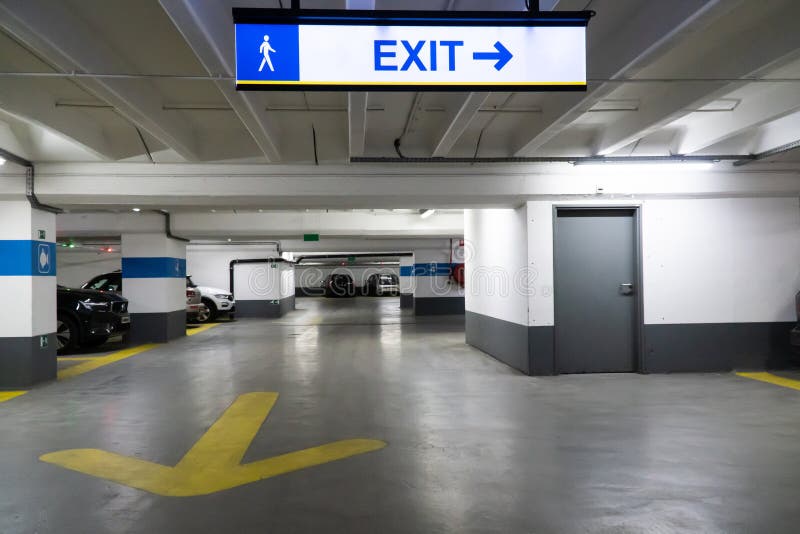 Exit Sign Underground Parking Stock Image - Image of painted ...