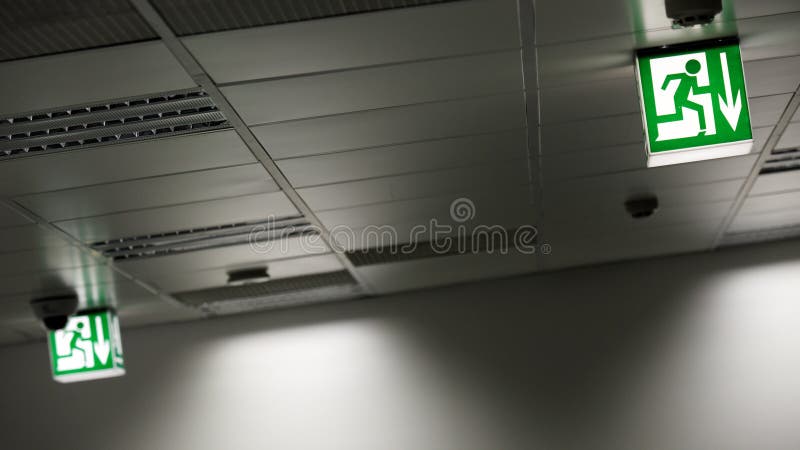 Exit sign on the wall stock photo. Image of fire, illuminated - 33993234