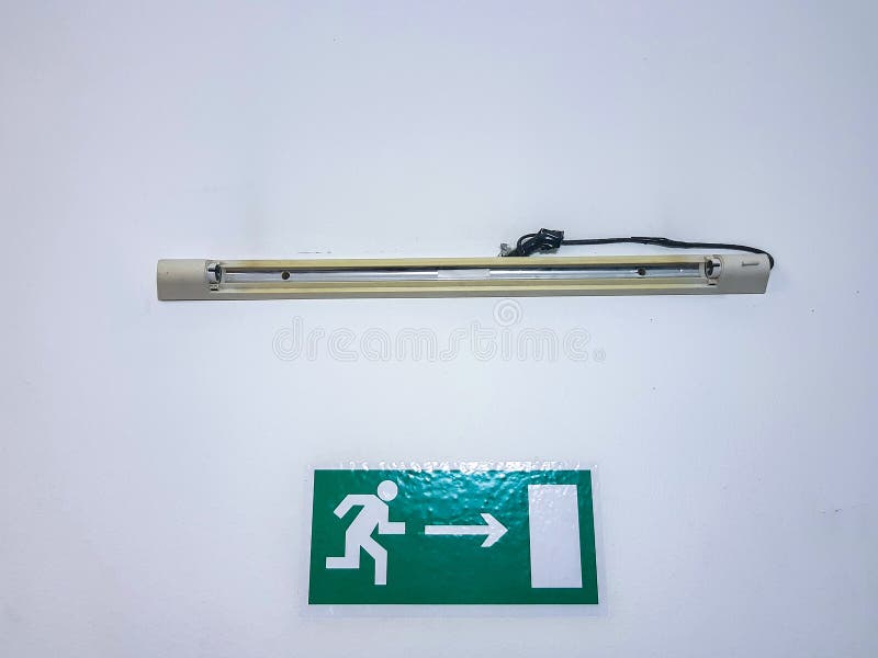 Exit sign on the wall stock photo. Image of destination - 123412094