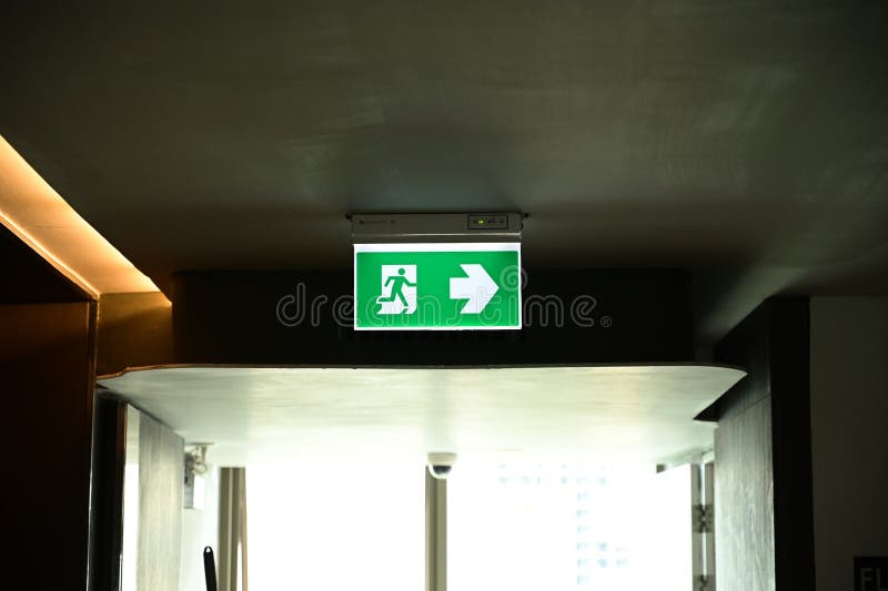 Exit Symbol for Warning People, Green Light Stock Image - Image of ...