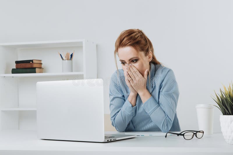 Exited Woman Surprised by Something Watching Her Laptop at Office ...