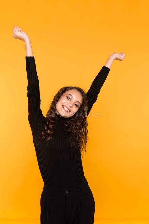 Exited Young Model Putting Her Hands Up Isolated. Stock Photo - Image ...