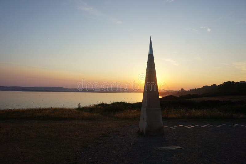 The Exmouth Geoneedle Against a Sunset Sky Stock Image - Image of ...